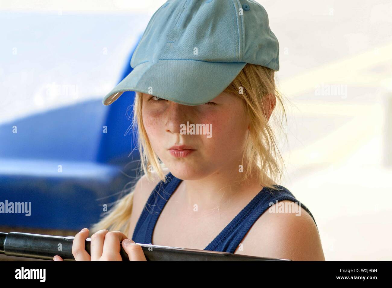 Girl wearing a baseball cap hi-res stock photography and images - Alamy