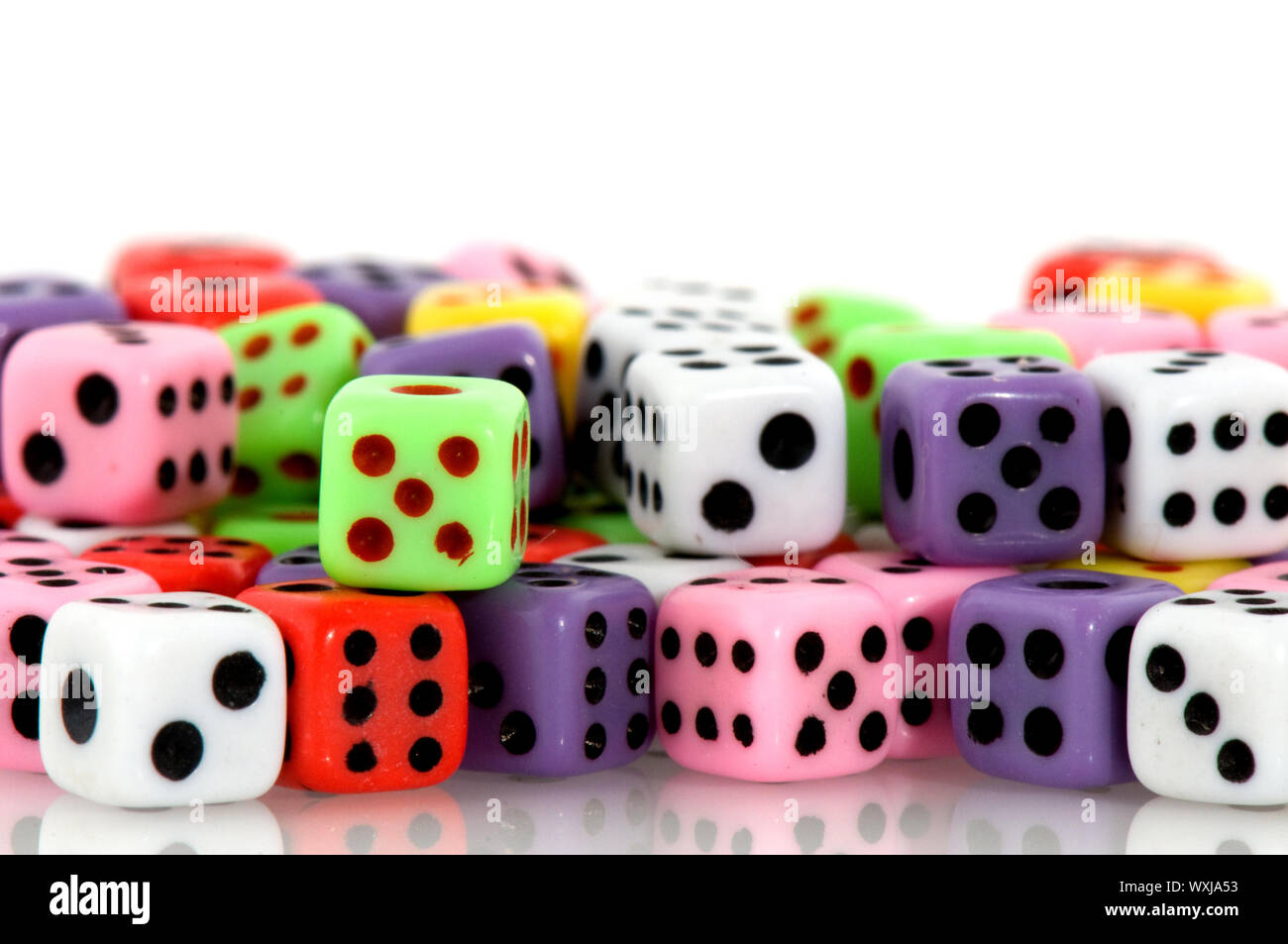 Many dices in different colors Stock Photo - Alamy