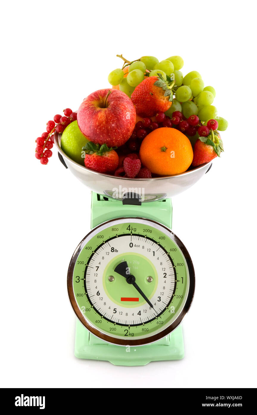 kitchen weight scale with diversity fruit Stock Photo - Alamy