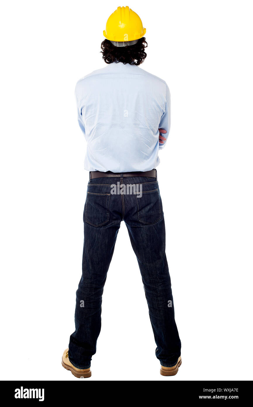 Male architect facing the wall, full length shot Stock Photo - Alamy