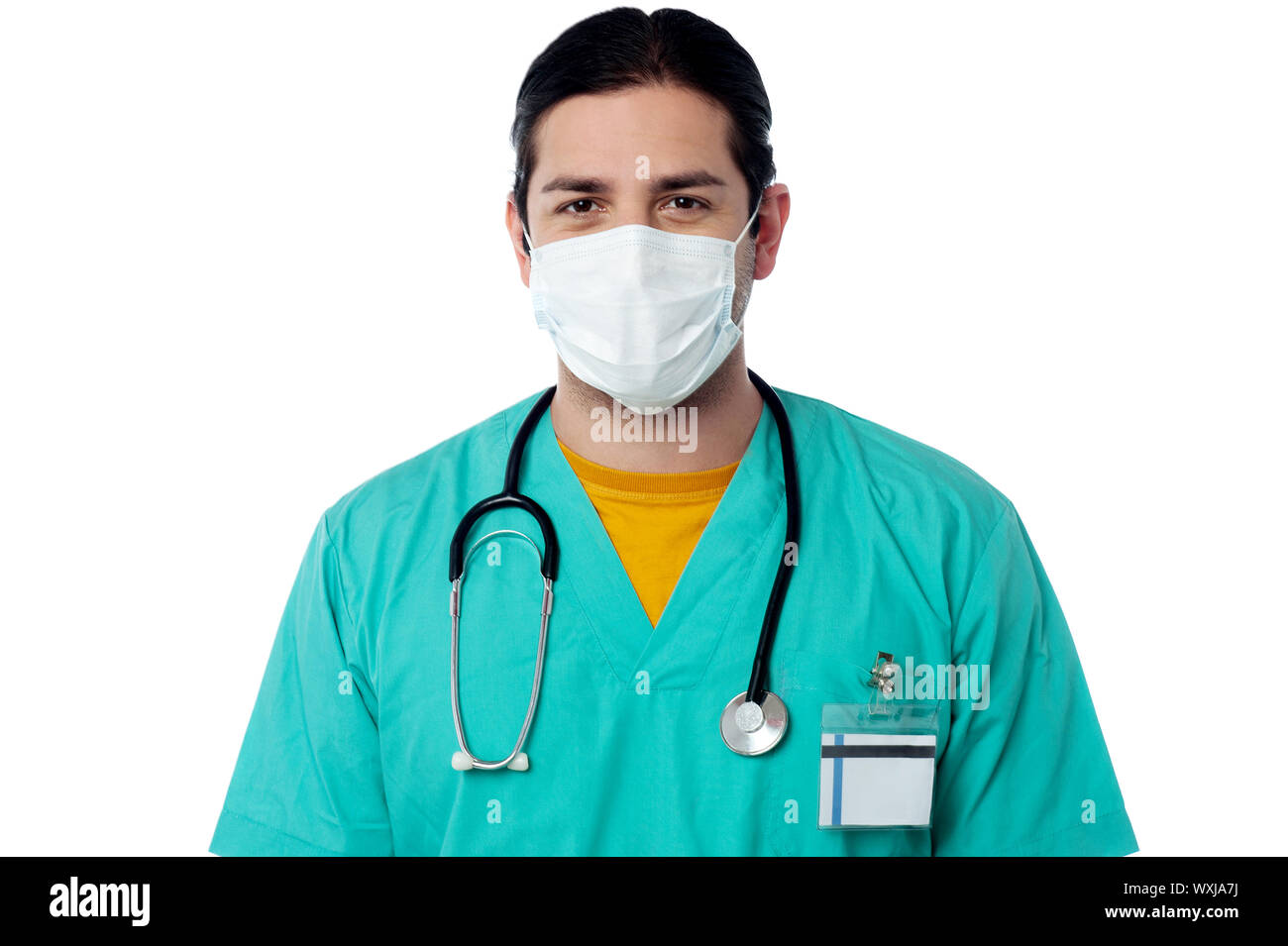Male physician covering face with surgical mask Stock Photo - Alamy