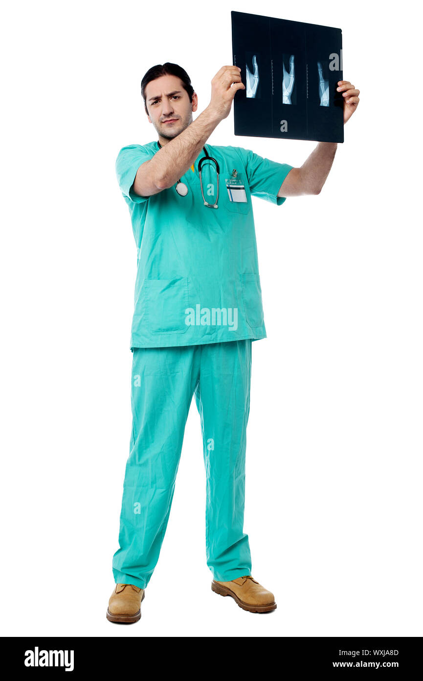 Smart physician with x-ray sheet of a patient Stock Photo - Alamy