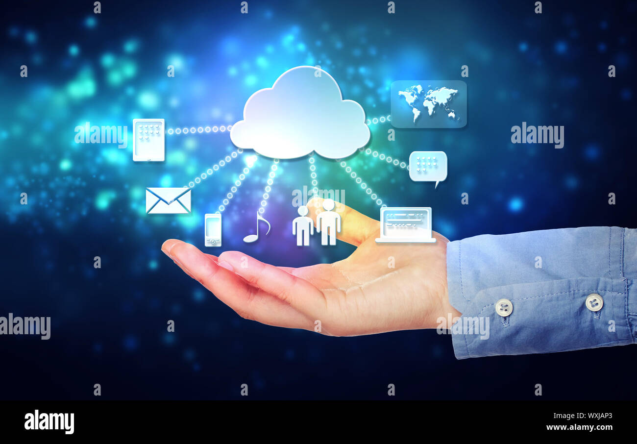 Cloud computing connectivity concept being held in a one persons hand ...