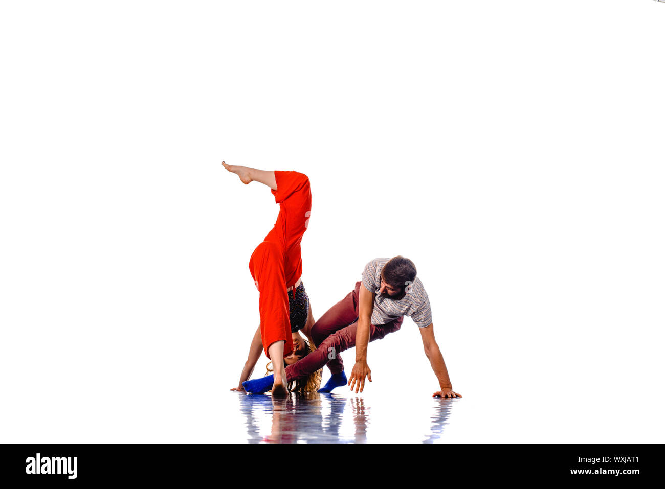 Ballet dancers in movement. Modern style dancers dancing contemporary ...