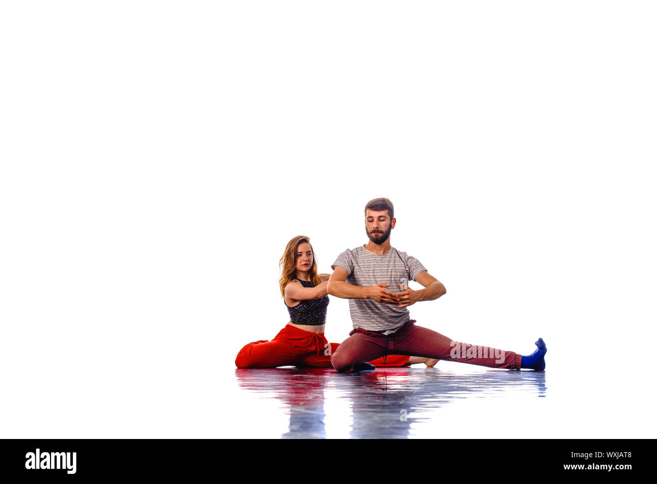 The two young modern ballet dancing over white studio background Stock ...