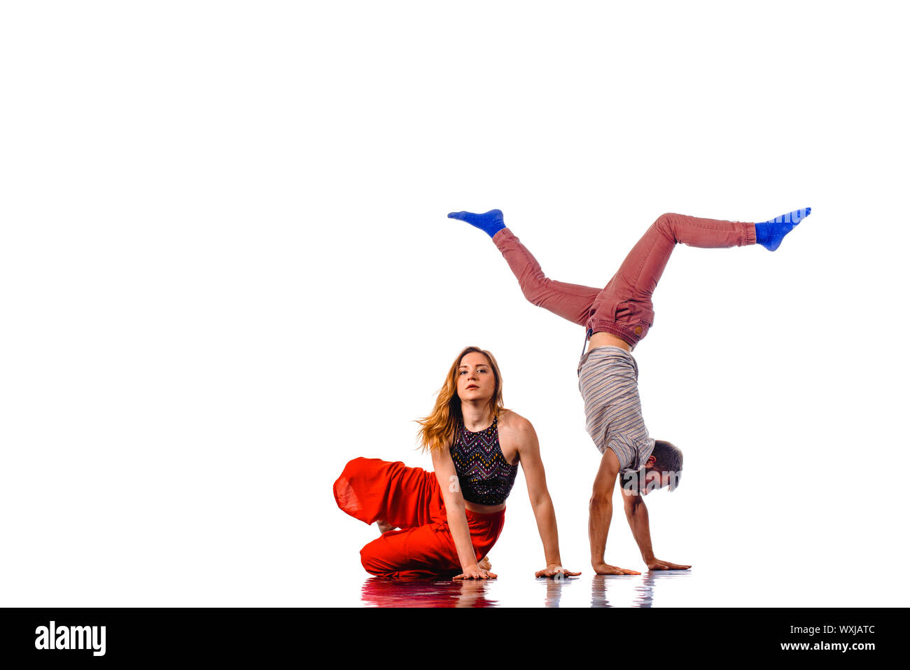 The two young modern ballet dancing over white studio background Stock ...