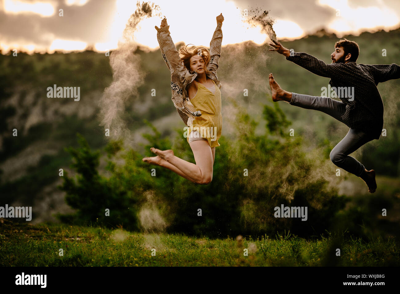 The two young modern ballet dancers training dance routine in the ...