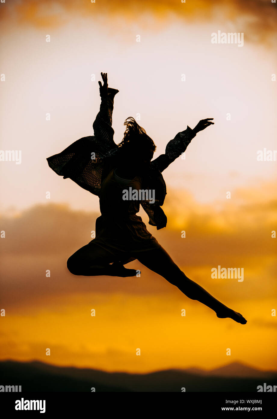 Passionate young woman dancer in a beautiful dreamy pose Stock Photo ...
