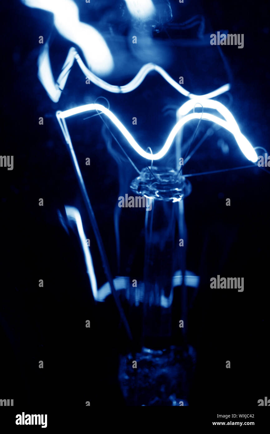 lamp power shine on black background Stock Photo - Alamy