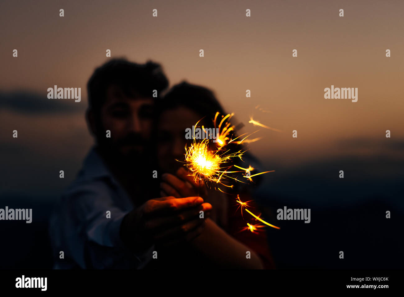 Group celebrating dusk silhouette hi-res stock photography and images - Alamy