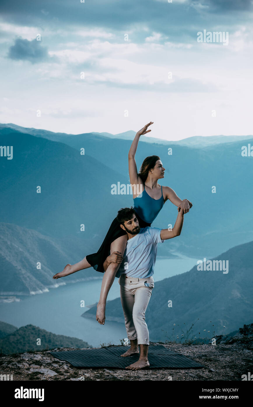 Young beautiful barefoot couple dancer practicing modern dance Stock ...