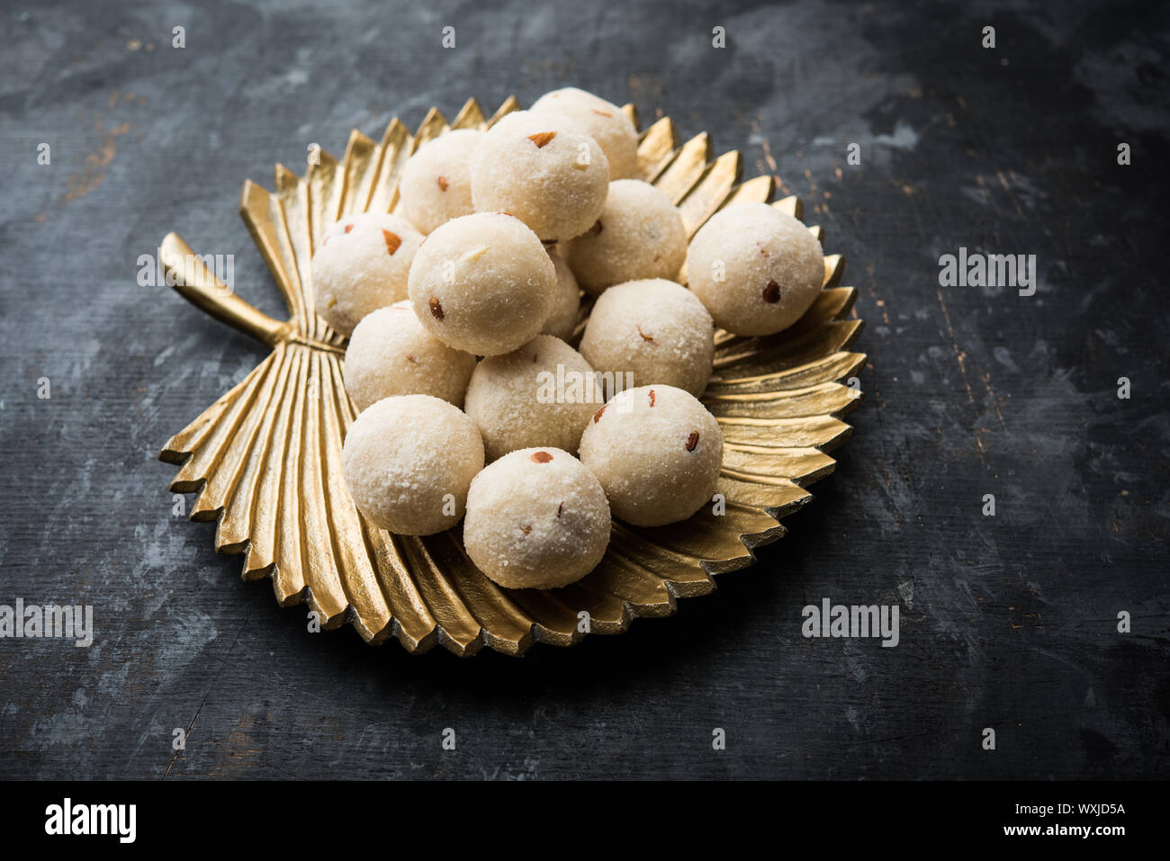 Rava Laddu or Semolina Laddoo Or Rawa Ladu, a popular sweet dish from ...