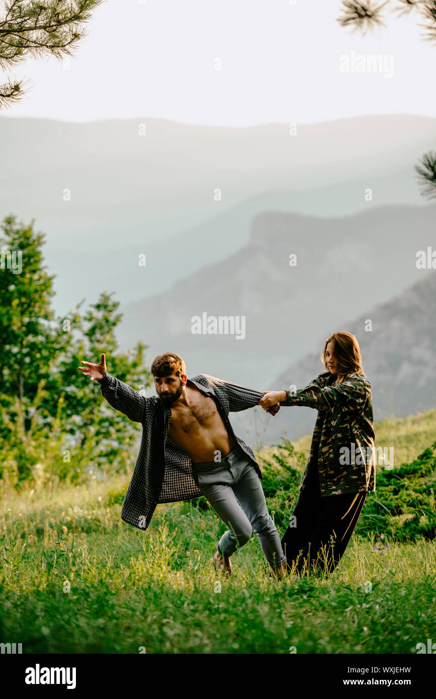 Sensual couple performing an artistical and emotional contemporary ...