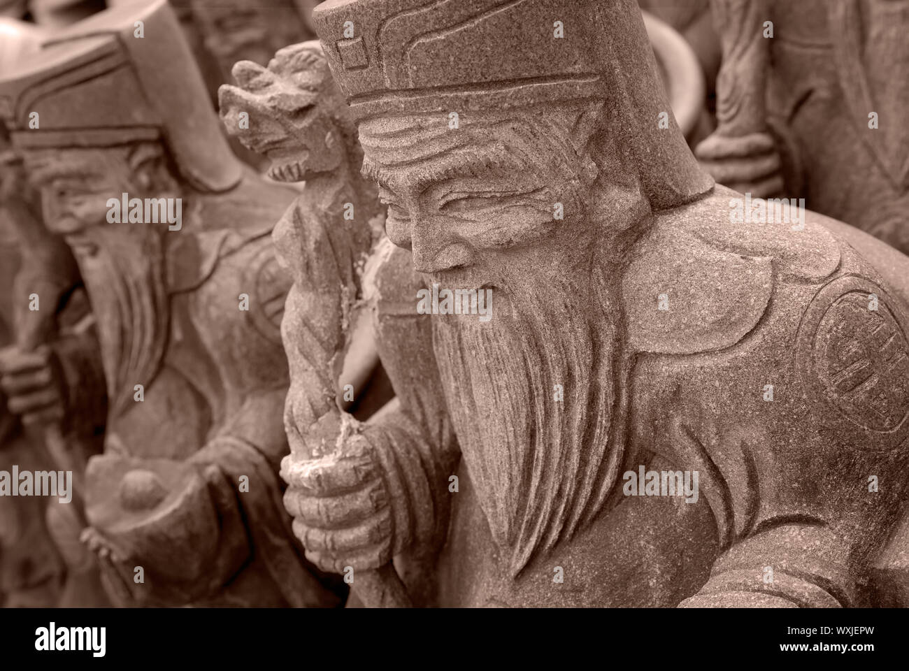 It is a group of chinese stone god of old man Stock Photo - Alamy