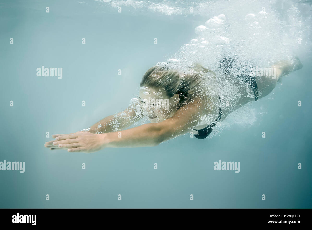 An image of a beautiful diving woman Stock Photo - Alamy