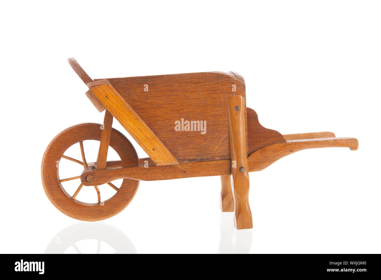 Classic wooden wheelbarrow isolated over white background Stock Photo ...