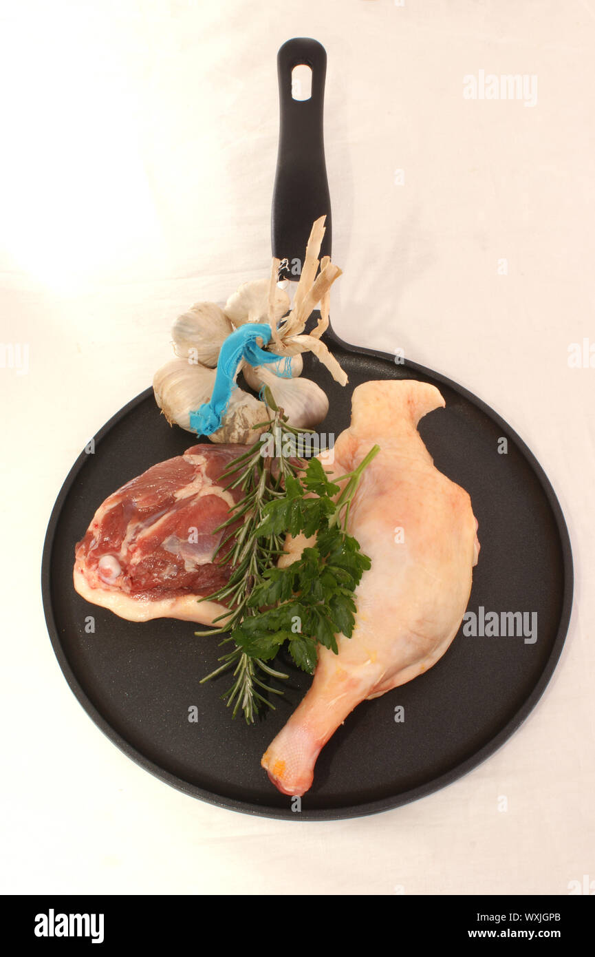 Duck legs in a pan Stock Photo - Alamy