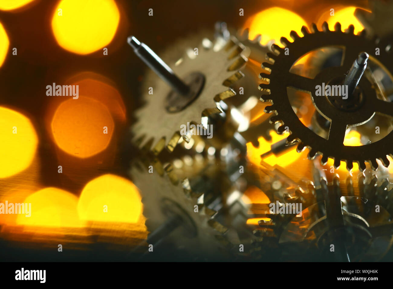 Golden cogwheels hi-res stock photography and images - Alamy