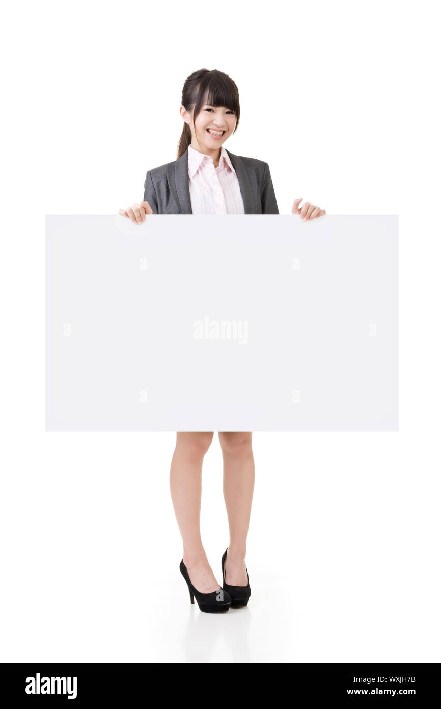 Asian business woman hold empty blank board. Full length portrait ... Asian business woman hold empty blank board. Full length portrait ...