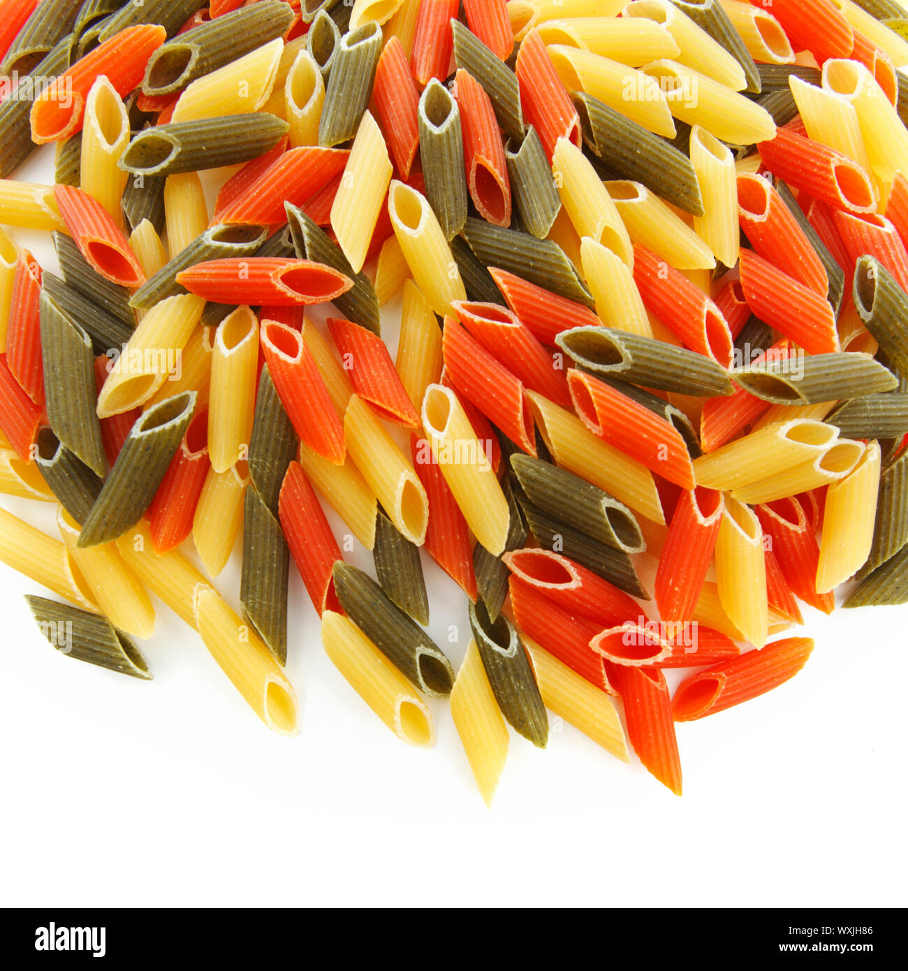 Colored pasta isolated on white background Stock Photo - Alamy