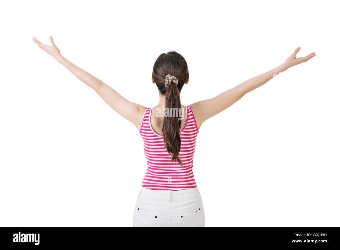 Asian woman stretch arms and feel free. Rear view. Isolated on white ...