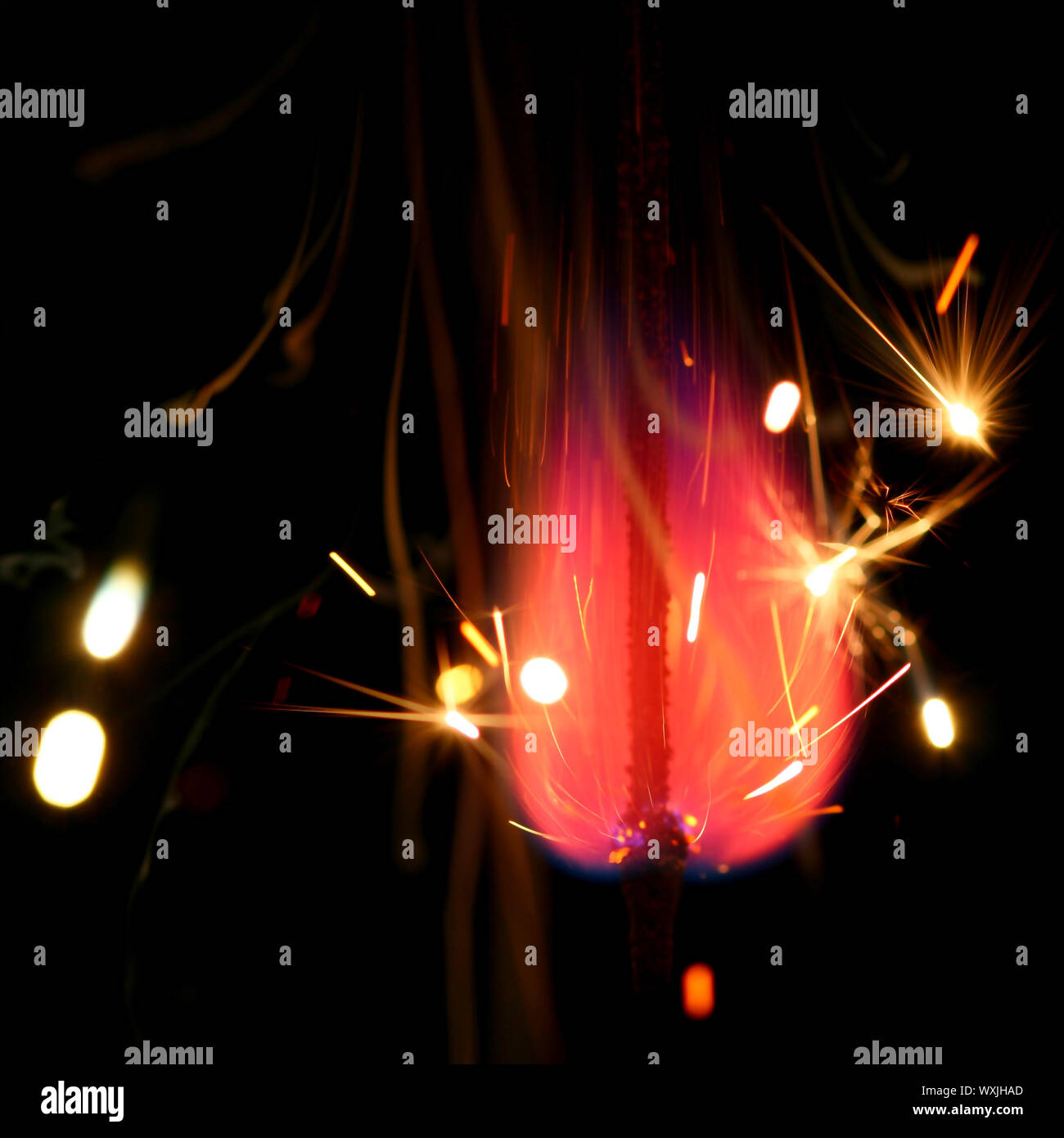 holiday flame on black background Stock Photo - Alamy