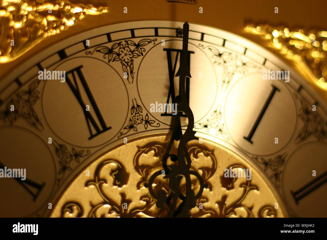 ancient golden wall clock closeup Stock Photo - Alamy