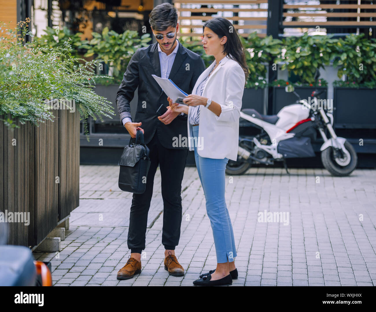 Image of two successful business partners talking at meeting and ...