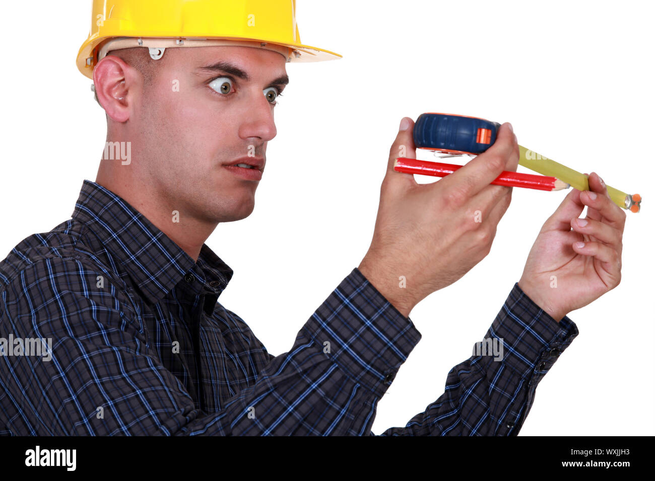 A construction worker impressed Stock Photo - Alamy