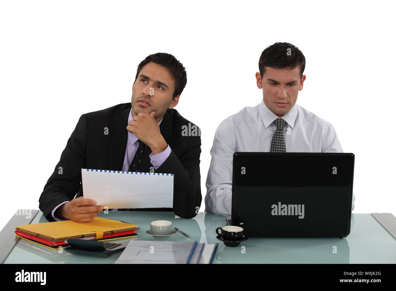 male colleagues working side by side Stock Photo - Alamy