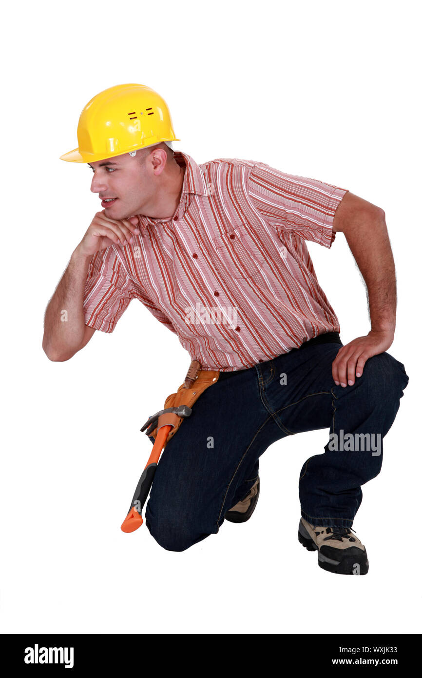 Tradesman with his elbow propped up on an invisible object Stock Photo ...