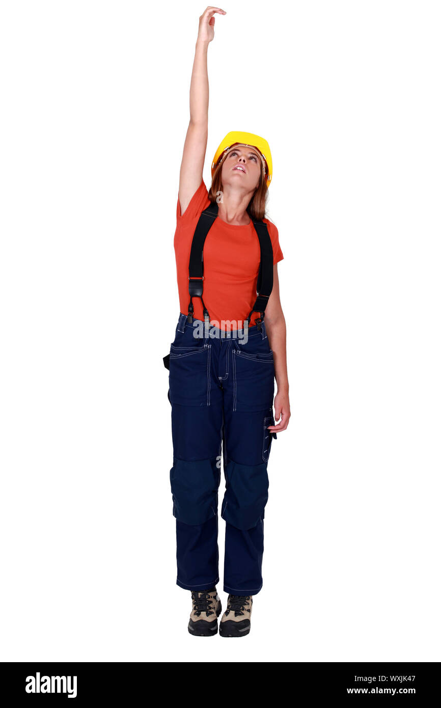 Woman touching the ceiling Stock Photo - Alamy