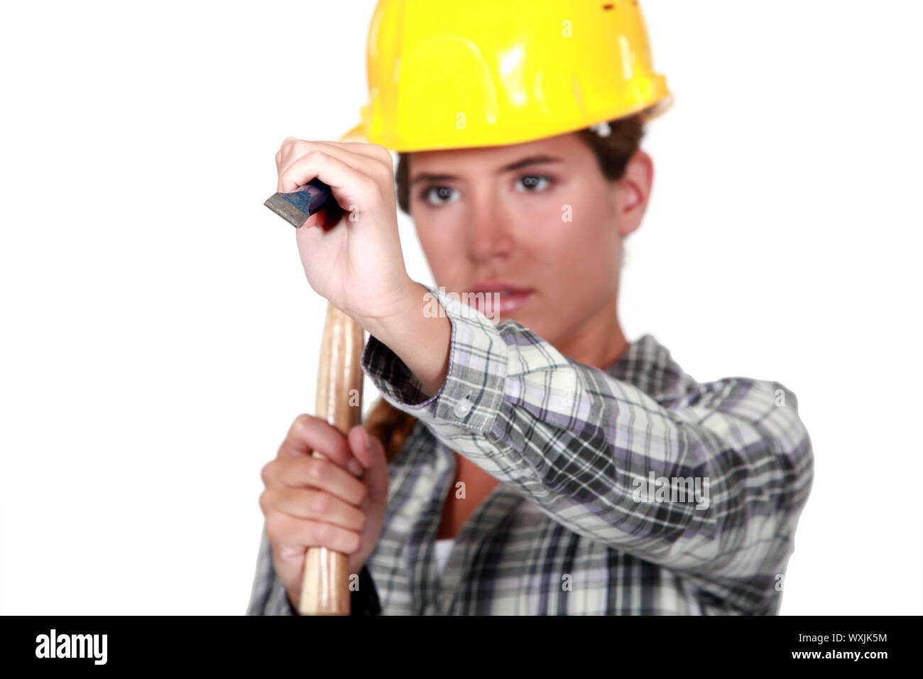 Woman with a hammer and chisel Stock Photo - Alamy