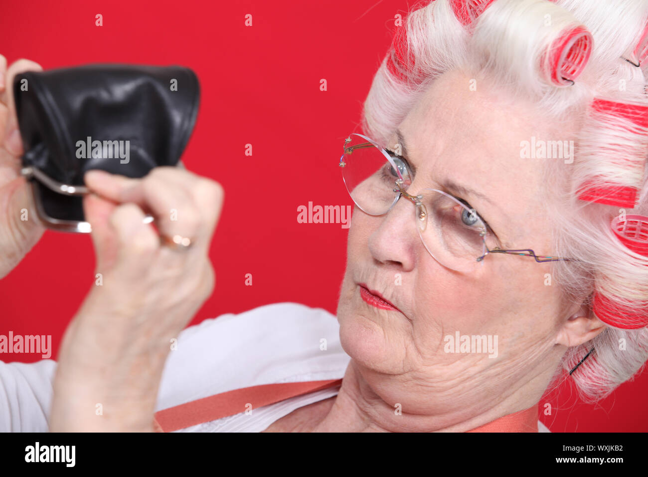 A broke old lady Stock Photo - Alamy