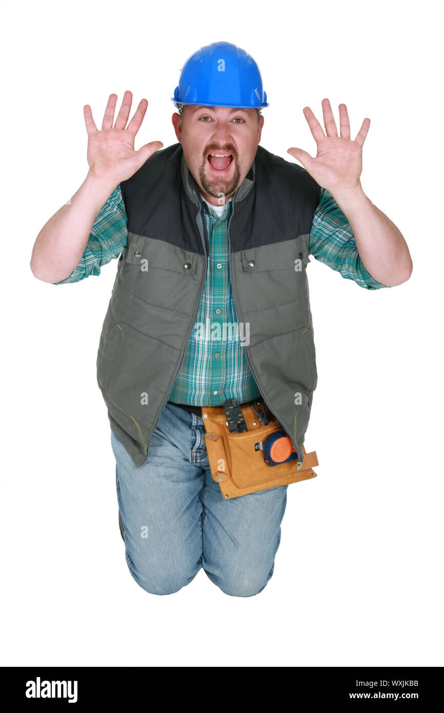 craftsman playing the fool against white background Stock Photo - Alamy