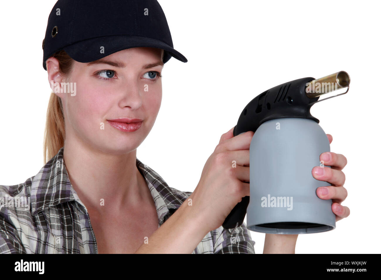 Woman with a blowtorch Stock Photo - Alamy