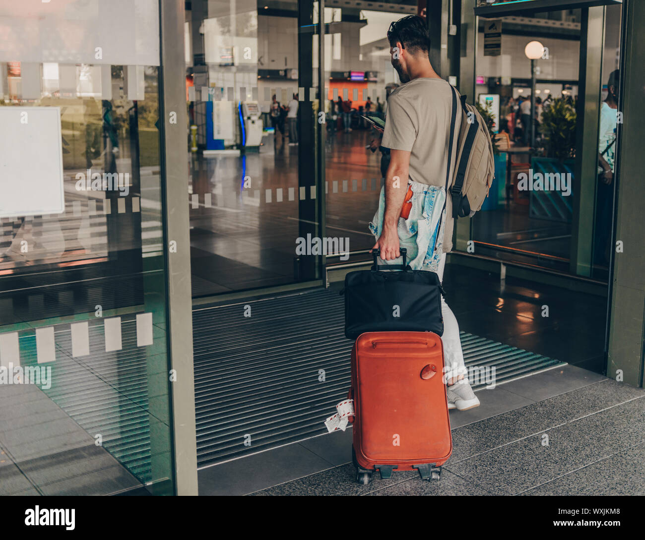 People watching flight information hi-res stock photography and images ...