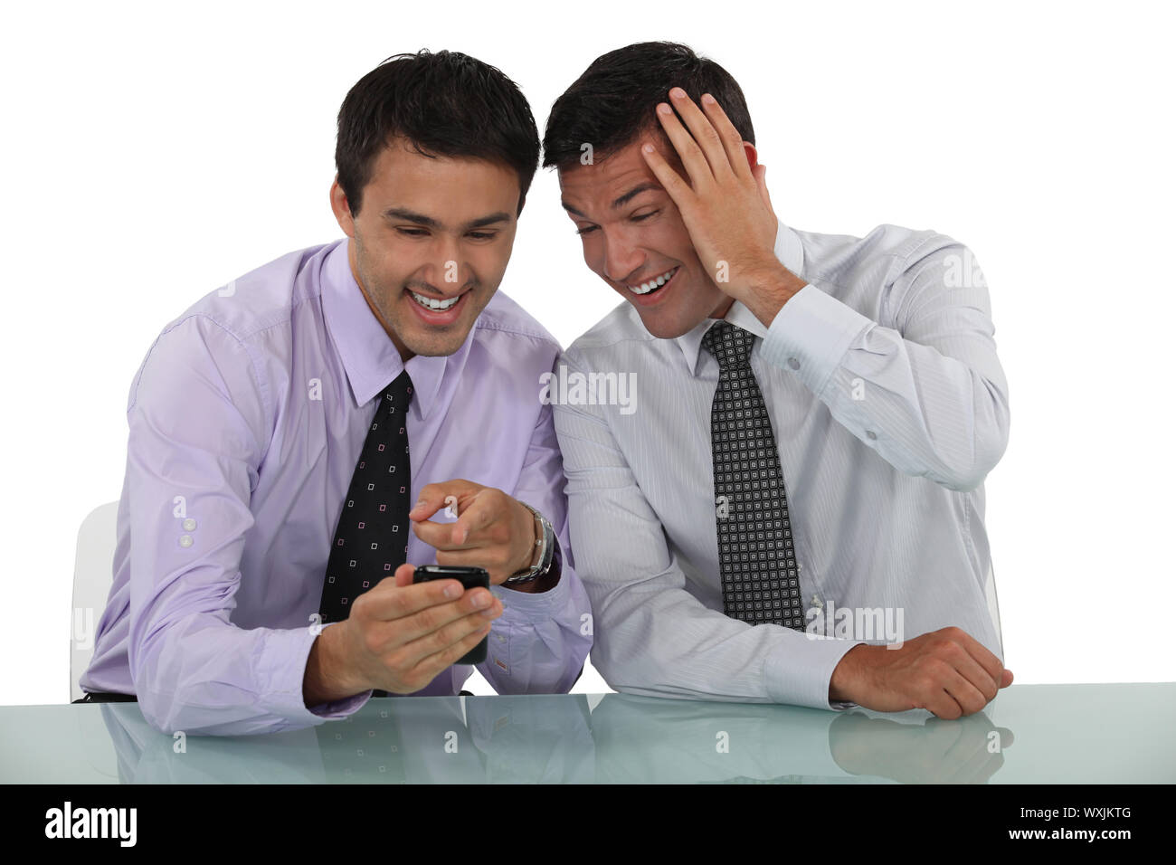 Sharing jokes hi-res stock photography and images - Alamy