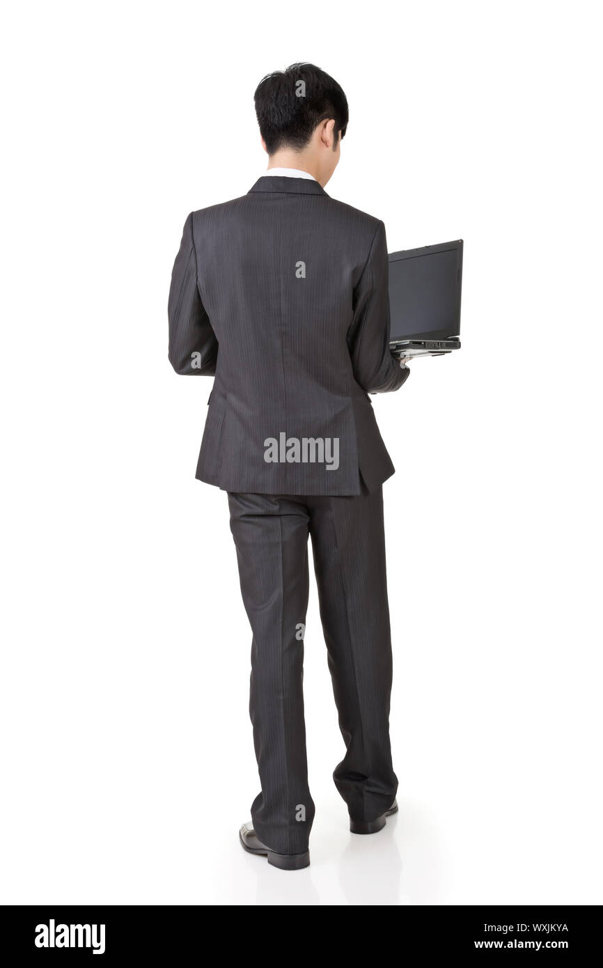 Rear view of Asian business man use laptop, full length portrait ...