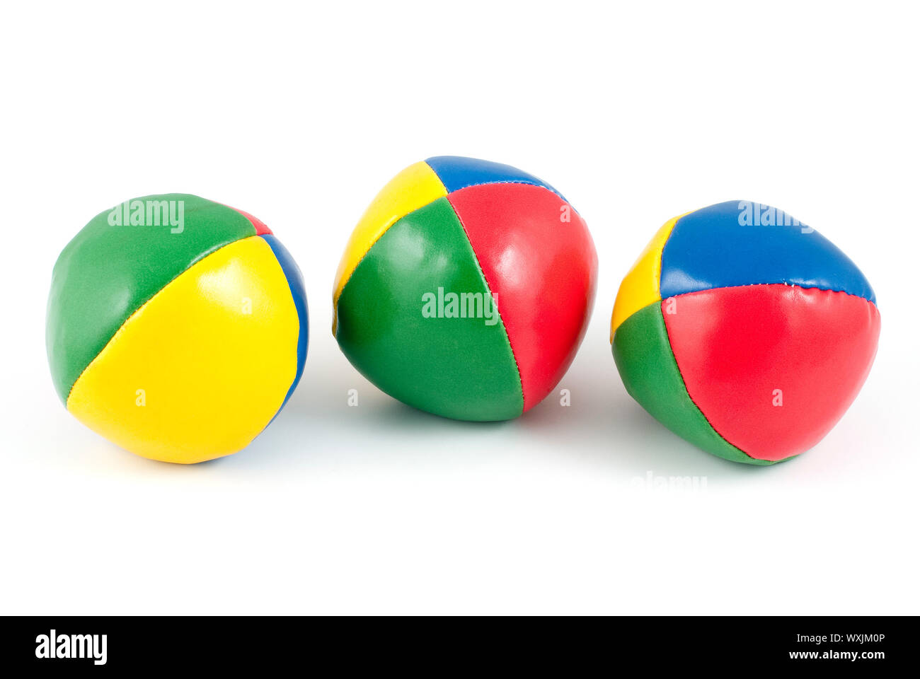 Three colorful juggling balls isolated on white background Stock Photo ...