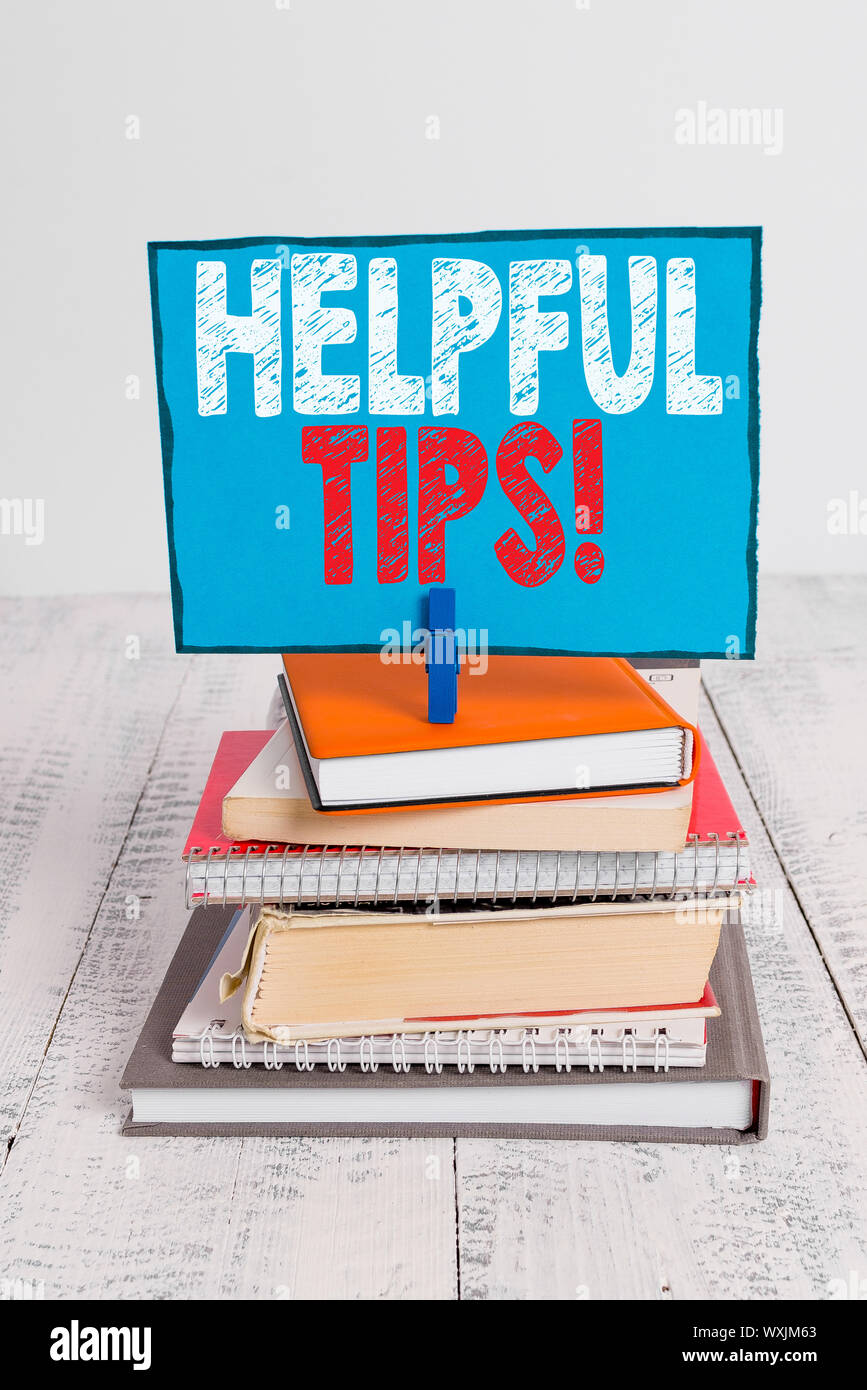 Writing note showing Helpful Tips. Business concept for advices given ...
