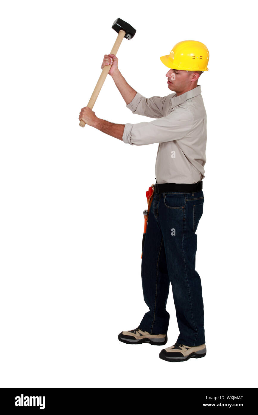 Young workman hammer Cut Out Stock Images & Pictures - Alamy