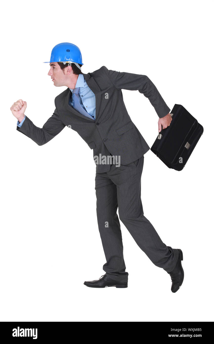 Architect running with briefcase Stock Photo - Alamy