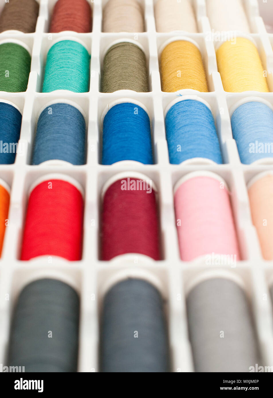 Colorful Spools of sewing thread Stock Photo - Alamy