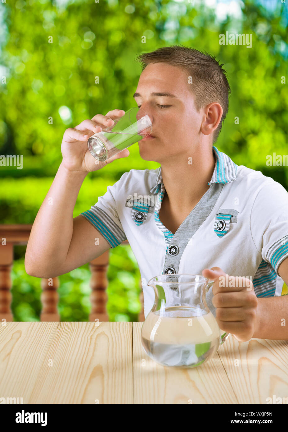 a guy drinking Stock Photo - Alamy