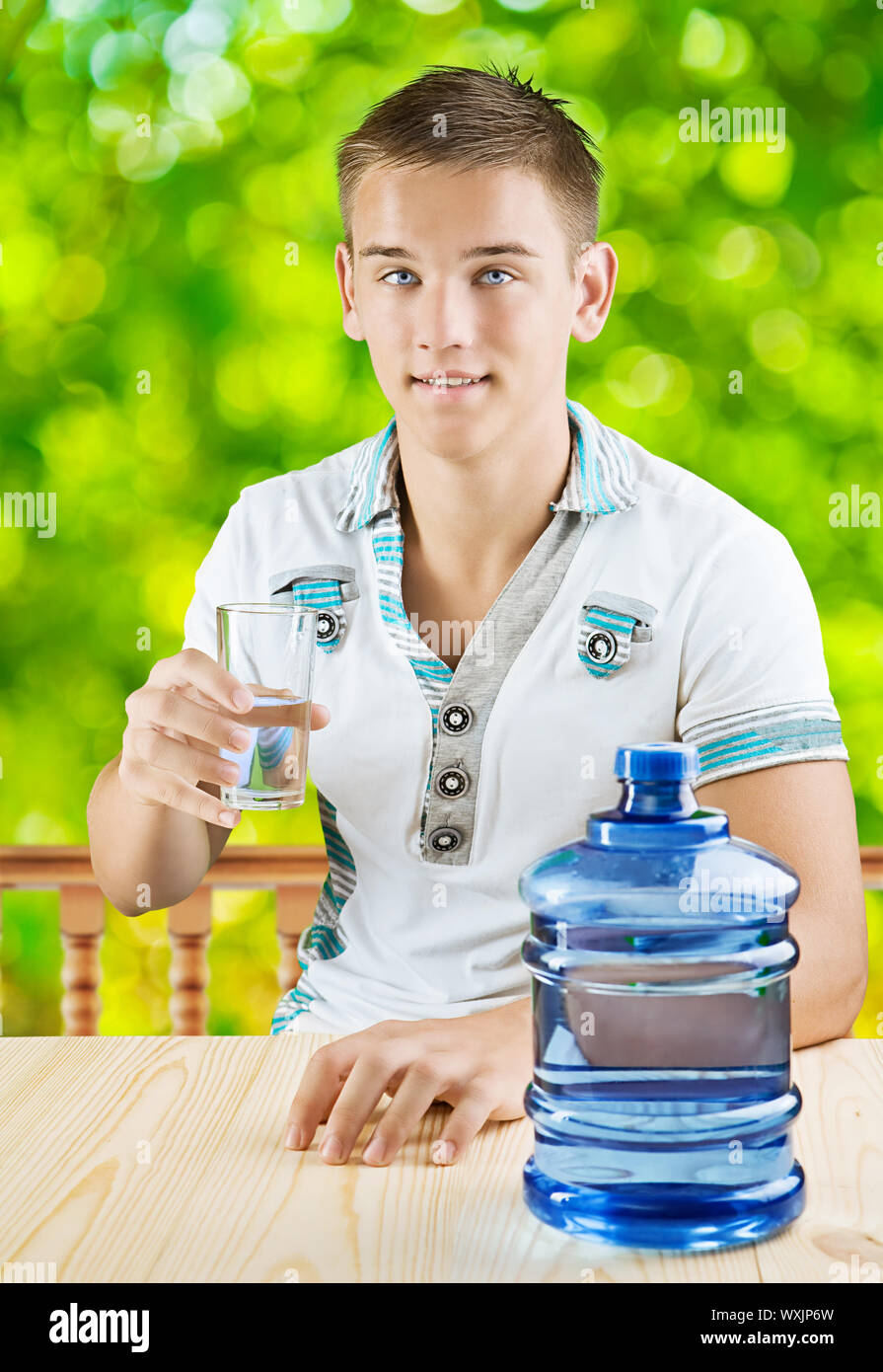 a guy with glass of water Stock Photo - Alamy