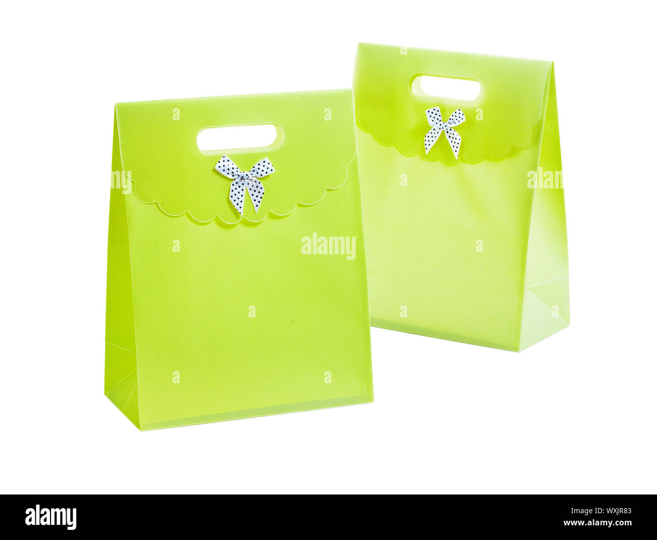 two green paperbags isolated on white Stock Photo - Alamy