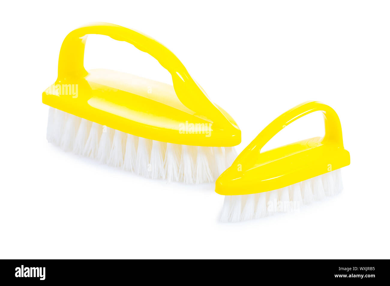yellow scrub brushes isolated Stock Photo - Alamy