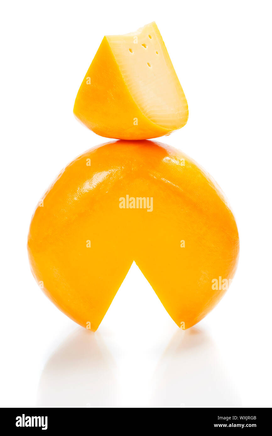 Traditional Gouda cheese over white Stock Photo - Alamy