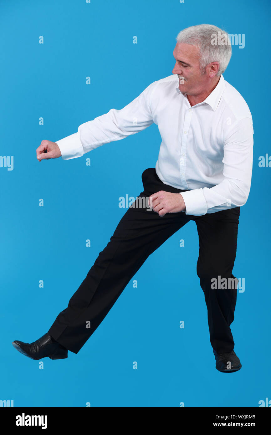 Elderly man dancing Stock Photo - Alamy